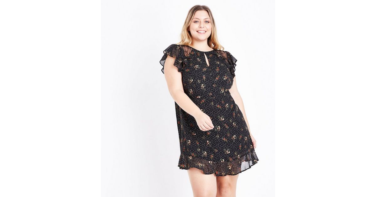 Curves - Robe noire à imprimé fleurs et étoiles avec empiècement en ...