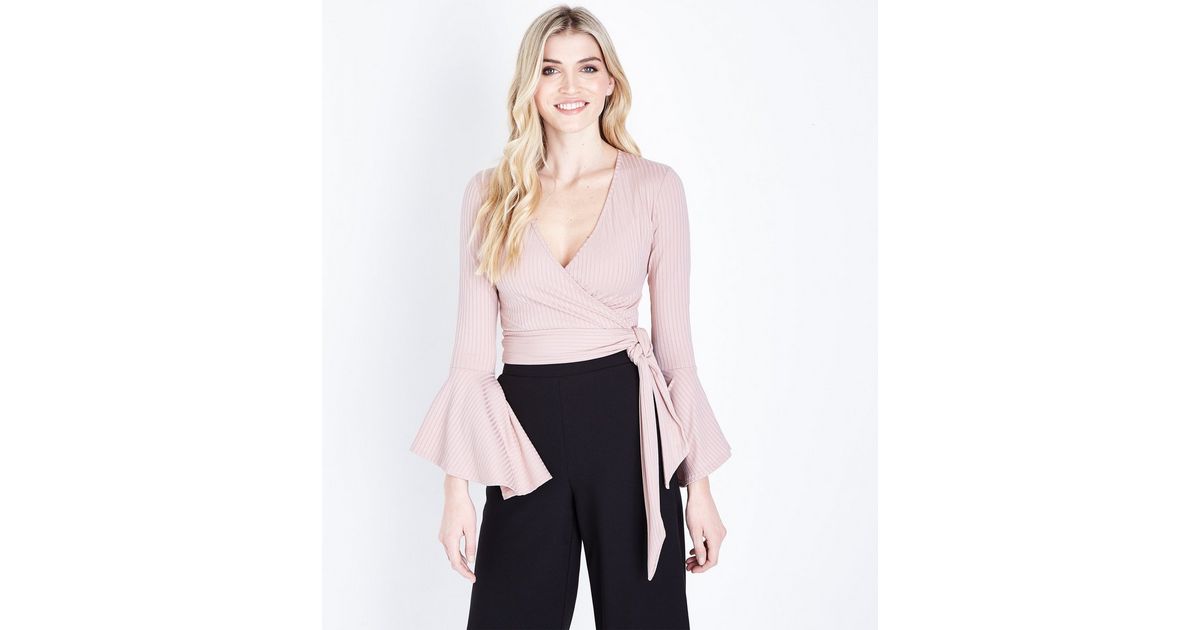 Pale Pink Ribbed Bell Sleeve Wrap Top | New Look