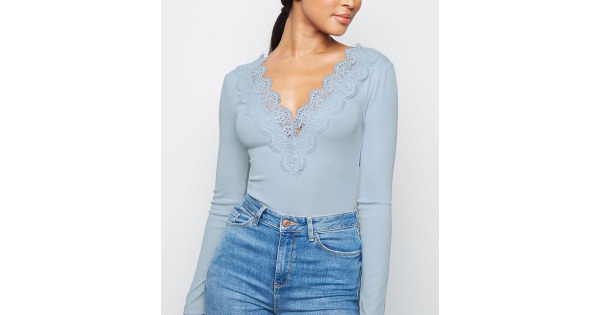 Pale Blue Ribbed Lace Trim Long Sleeve Bodysuit | New Look