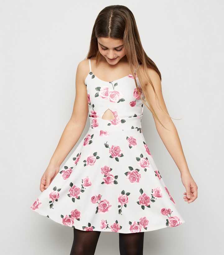 Cut Out Skater Dress BLACK FLORAL PRINT CUT OUT SKATER DRESS Midrra