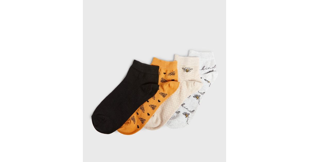 4 Pack Orange Mixed Be Kind Trainer Socks | New Look