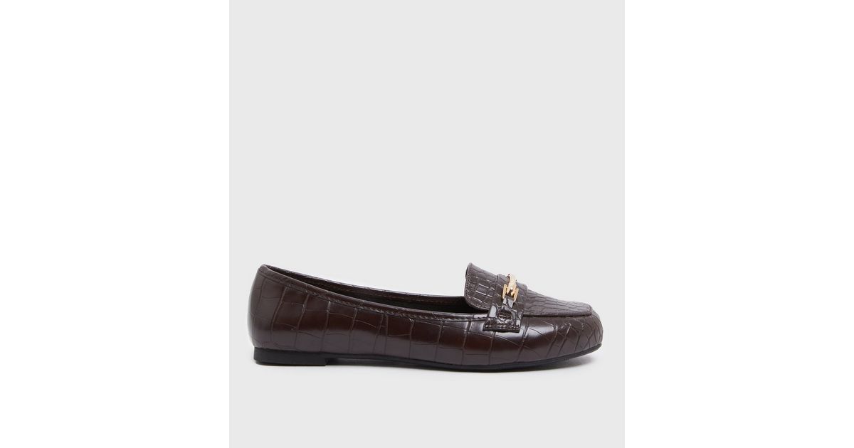 Wide Fit Rust Faux Croc Bar Loafers | New Look