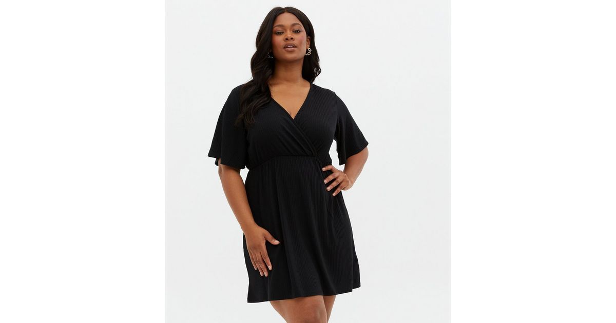 Curves Black Ribbed Jersey Mini Wrap Dress | New Look