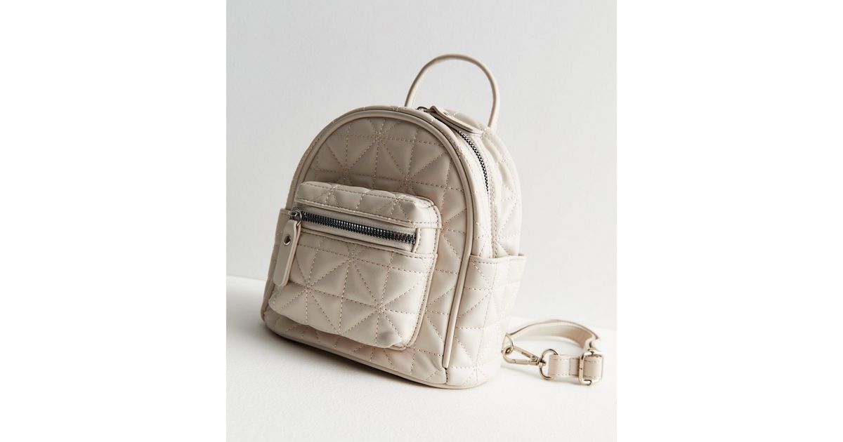 Cream Quilted Pocket Front Backpack | New Look