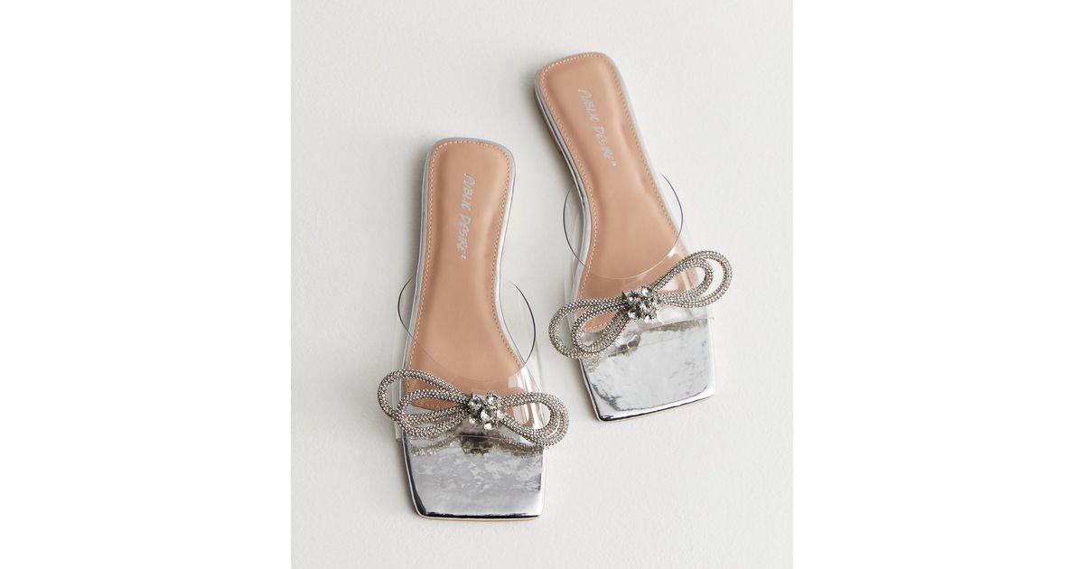 Public Desire Silver Bow Sliders | New Look