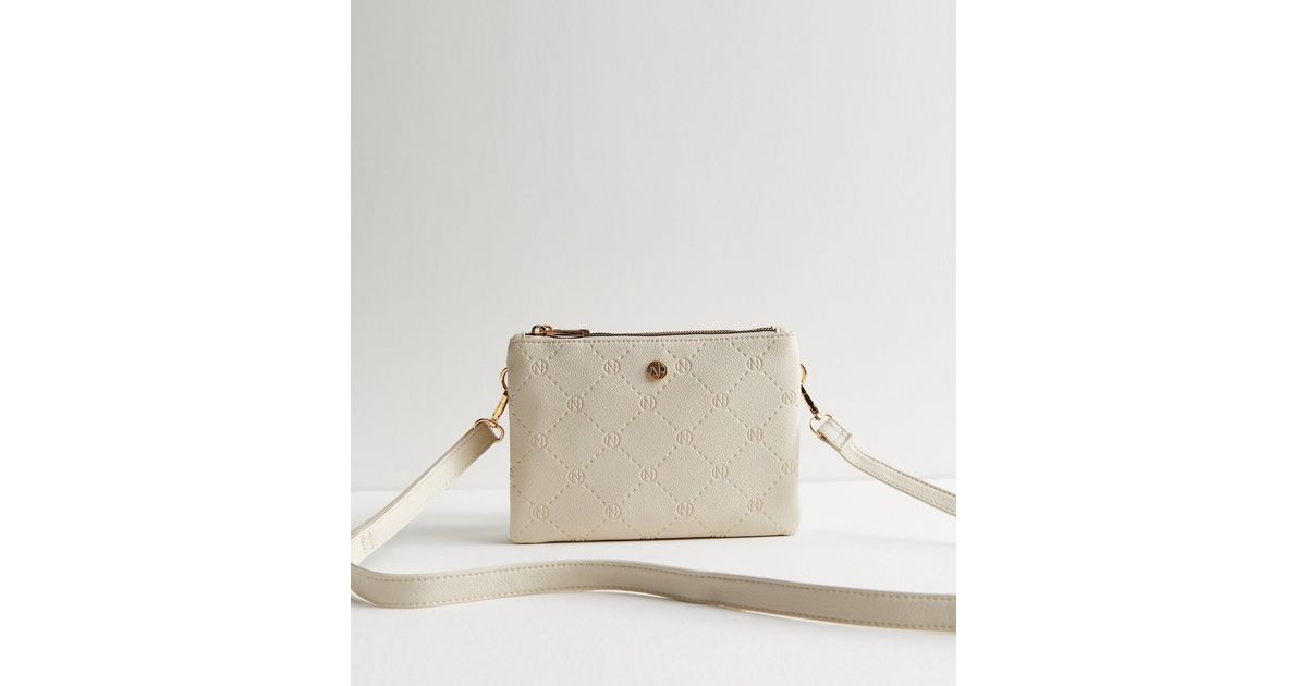 Cream Debossed Double Pocket Cross Body Bag | New Look