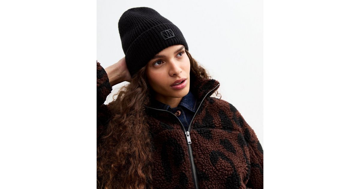 Black Logo Tab Rib Knit Beanie Hat | New Look