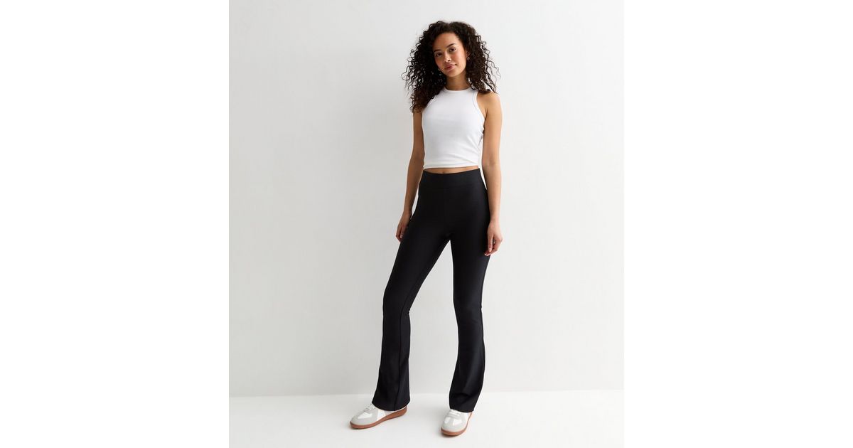 Tall Black Ribbed Flared Leggings | New Look