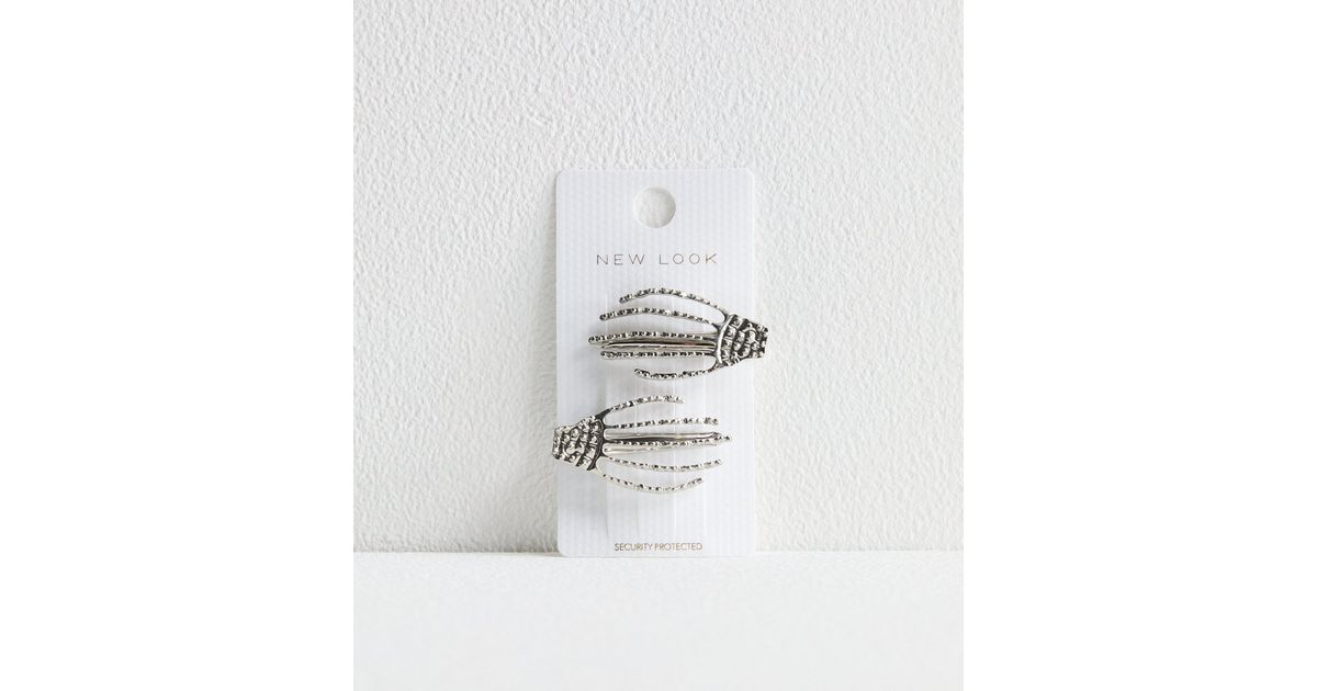 Silver Skeleton Hand Halloween Hair Slides | New Look