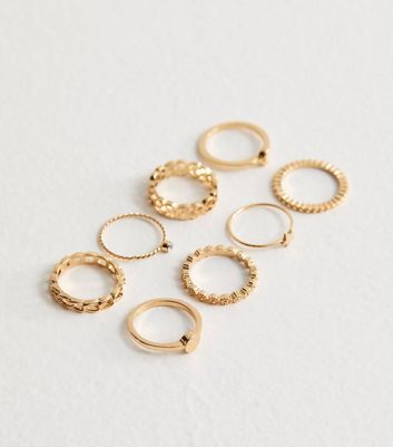 8 Pack of Gold Tone Moon Star Rings | New Look