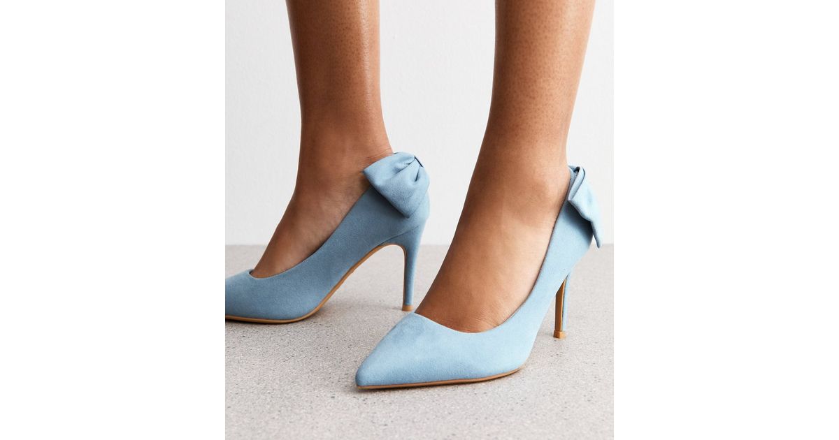 Wide Fit Blue Bow Back Faux Suede Court Shoes | New Look