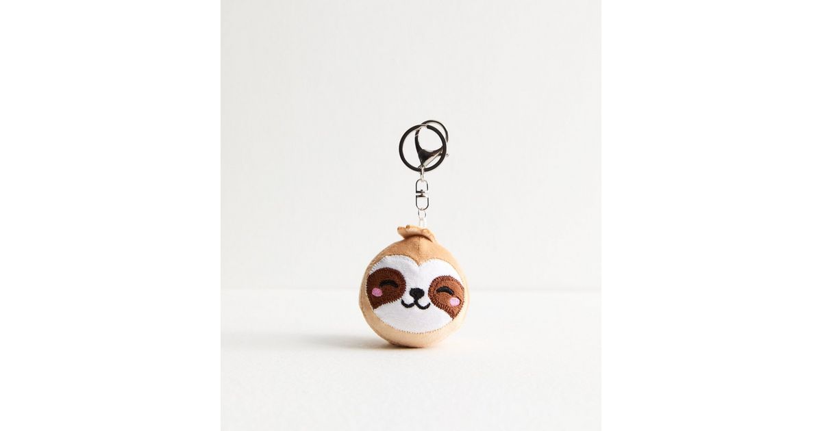Brown Smiley Sloth Bag Charm | New Look