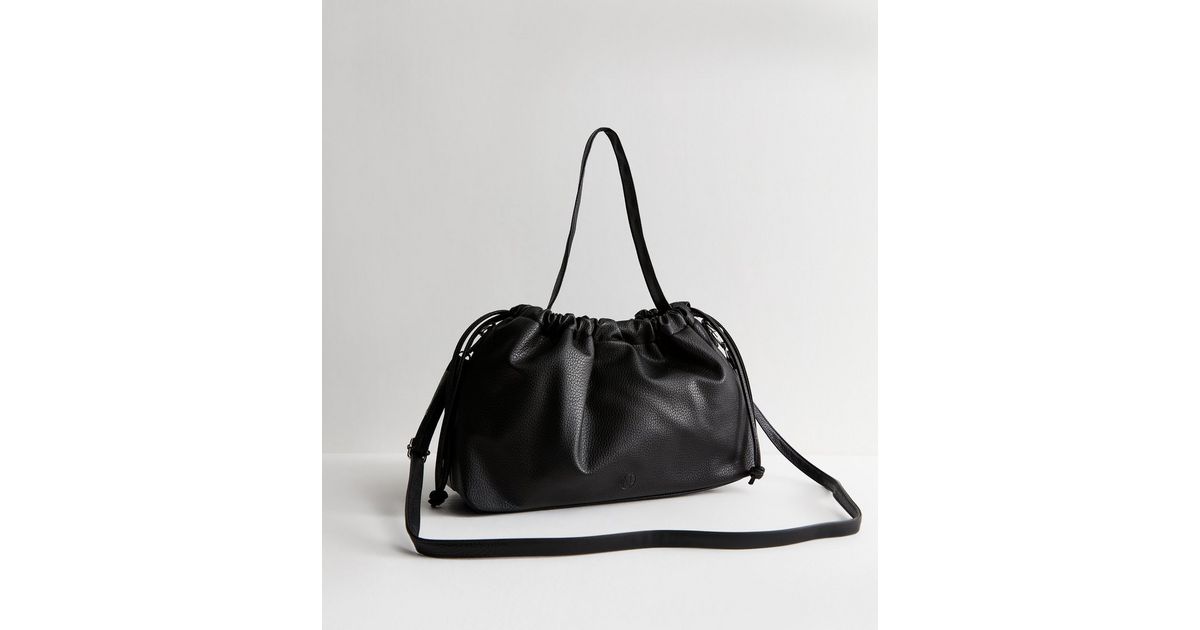 Black Pebbled Faux Leather Drawstring Hobo Bag | New Look