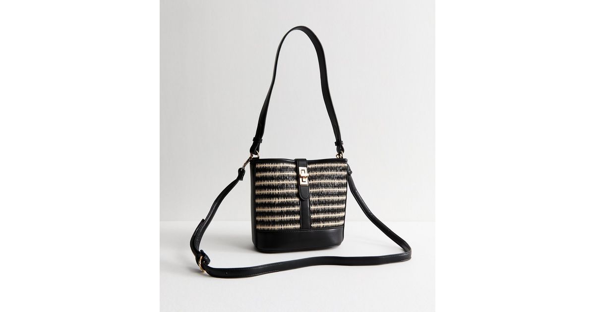 Black Faux Leather Twist Lock Raffia Look Stripe Bucket Bag | New Look
