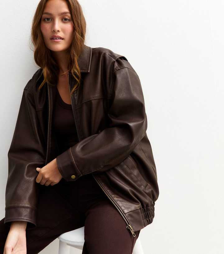 Dark Brown Oversized Washed Faux Leather Jacket | New Look