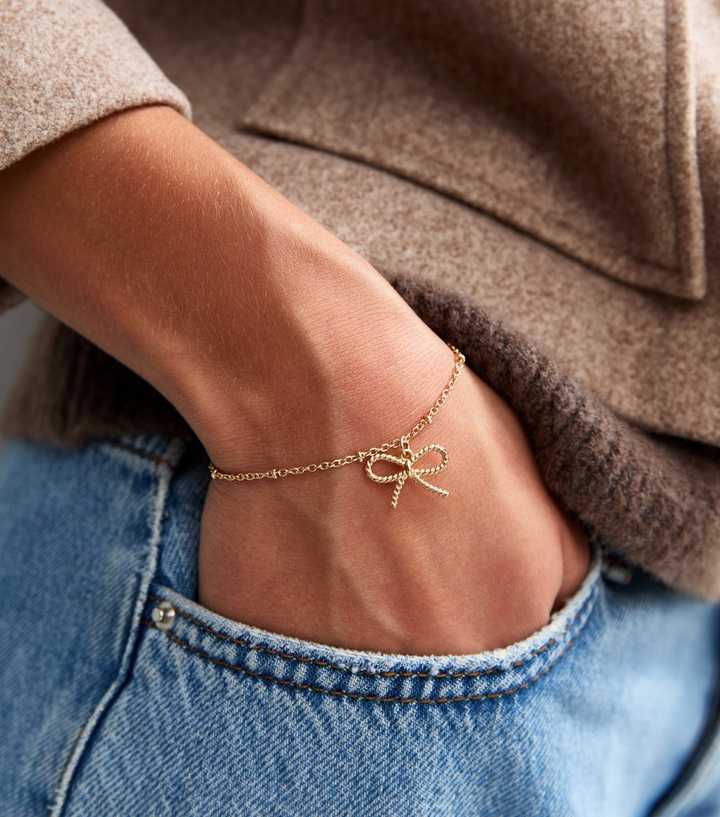 Gold Tone Ribbed Textured Bow Bracelet | New Look